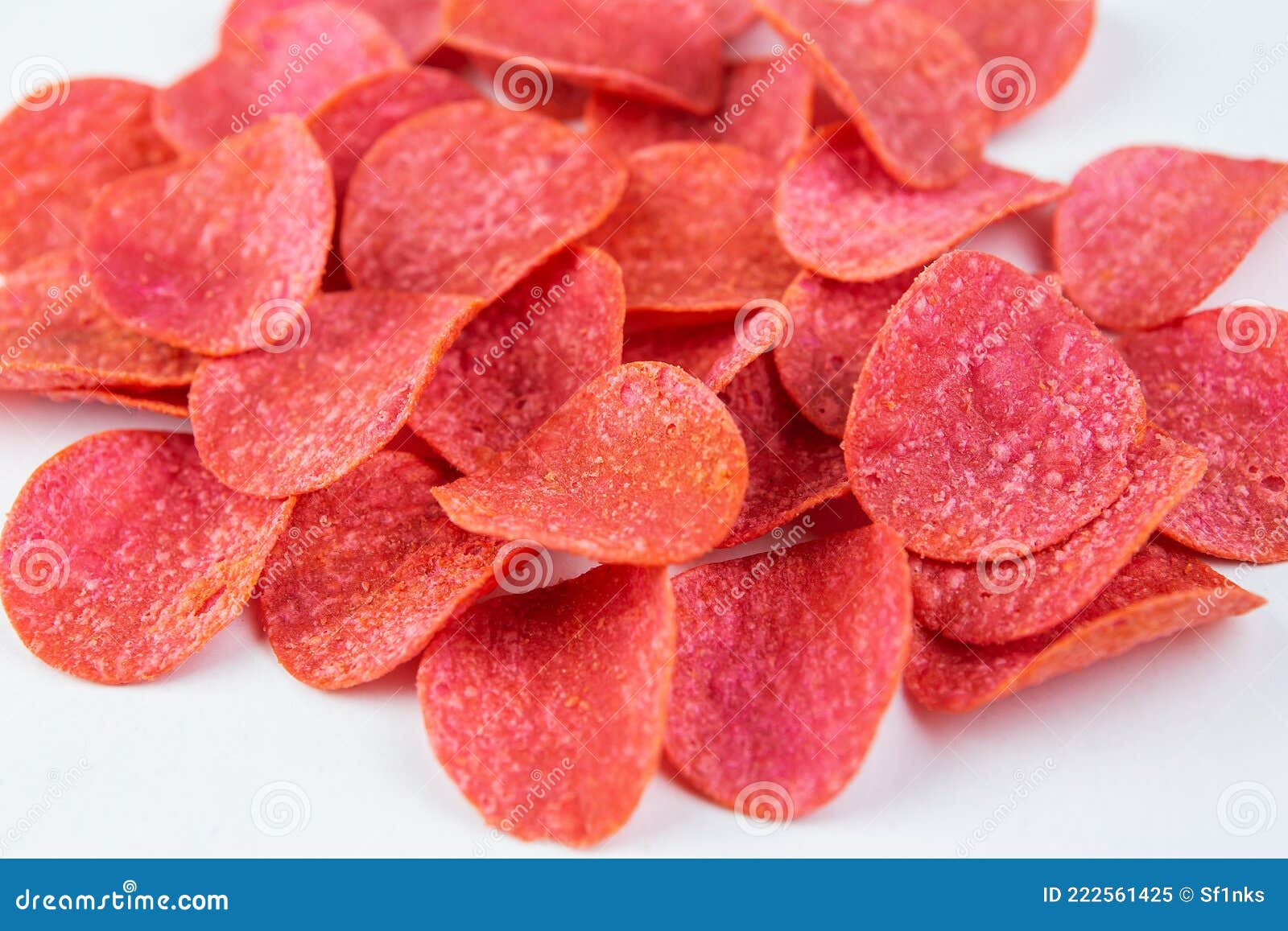 Red Chips with Hot Pepper Taste on a White Background. Beer Snack Stock ...