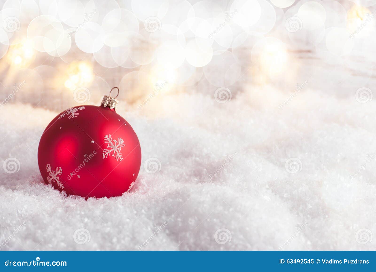 Red Christmas ball on snow stock image. Image of bright - 63492545