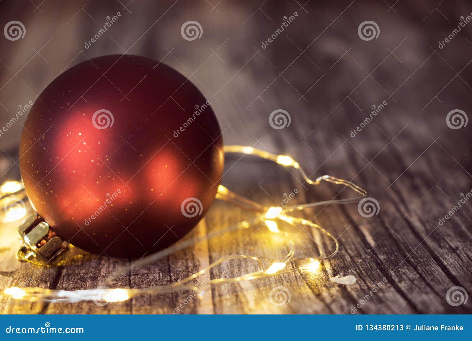 Red Christmas Bauble with Glitter and LED Light String Stock Image ...