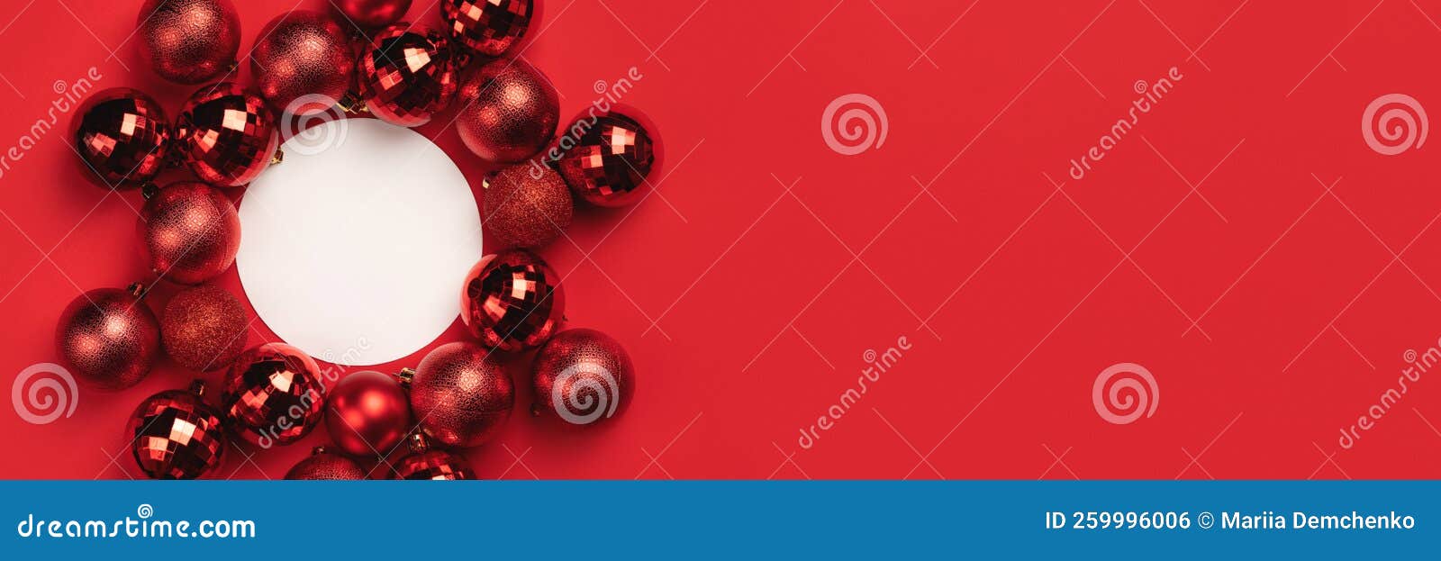 Red Christmas Decorations Around White Circle on Red Background with ...