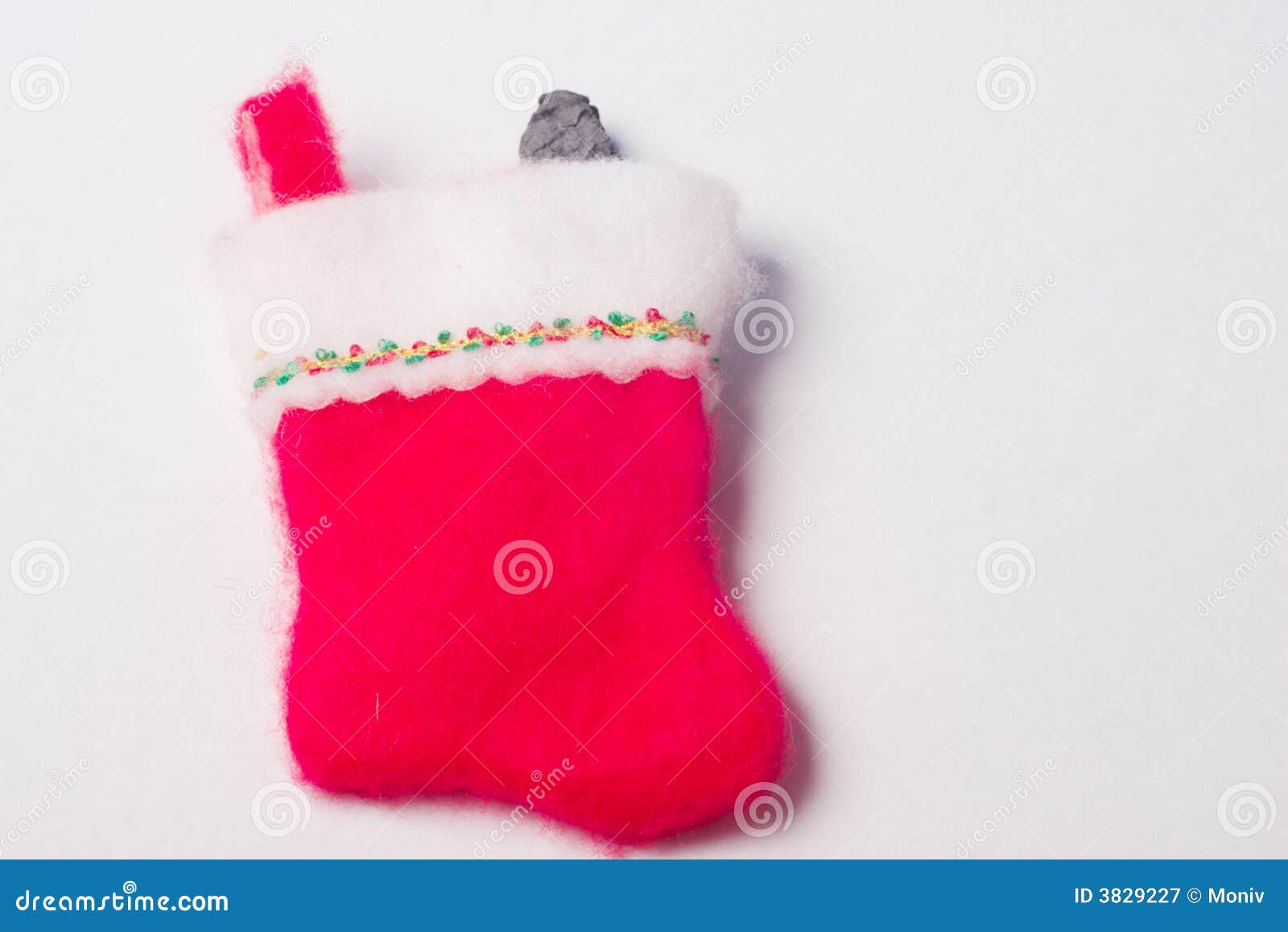 Red Christmas Stocking with Lump of Coal Sticking Stock Image - Image ...
