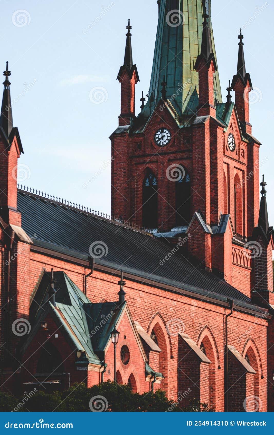 Red Church Building with a Clock on Top Stock Photo - Image of landmark ...