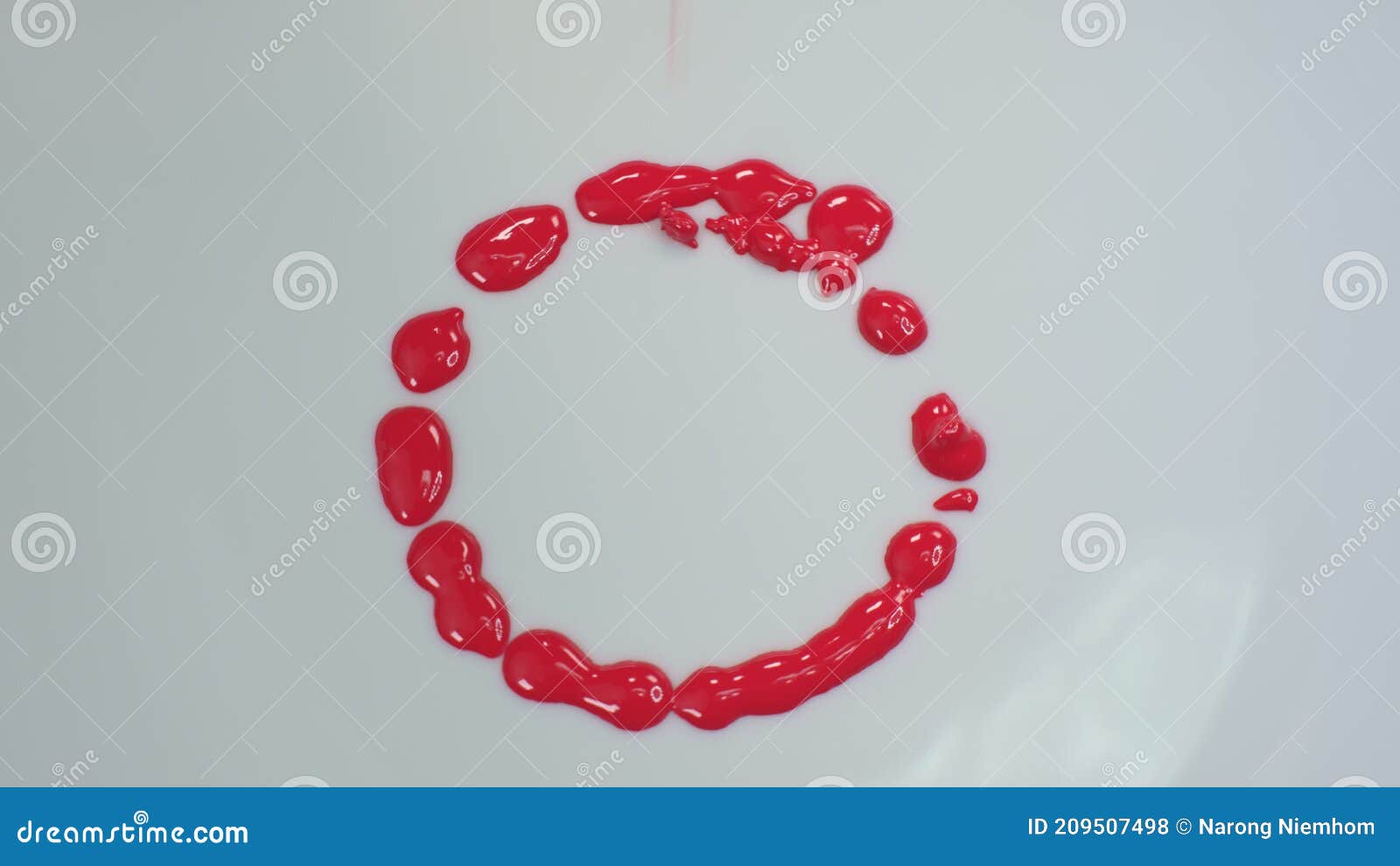 A Red Circle Drips Onto a Spinning White Background. Stock Footage ...