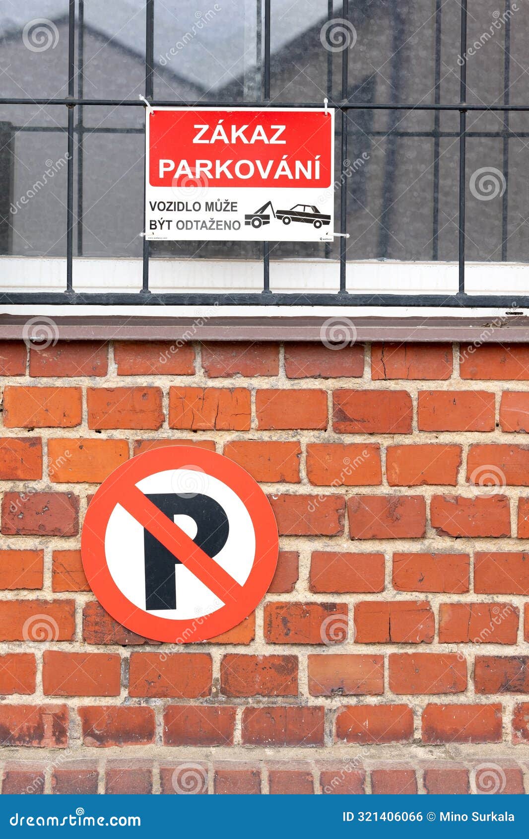 Red Circle Traffic Sign and Rectangular Sign Restricting Parking in ...