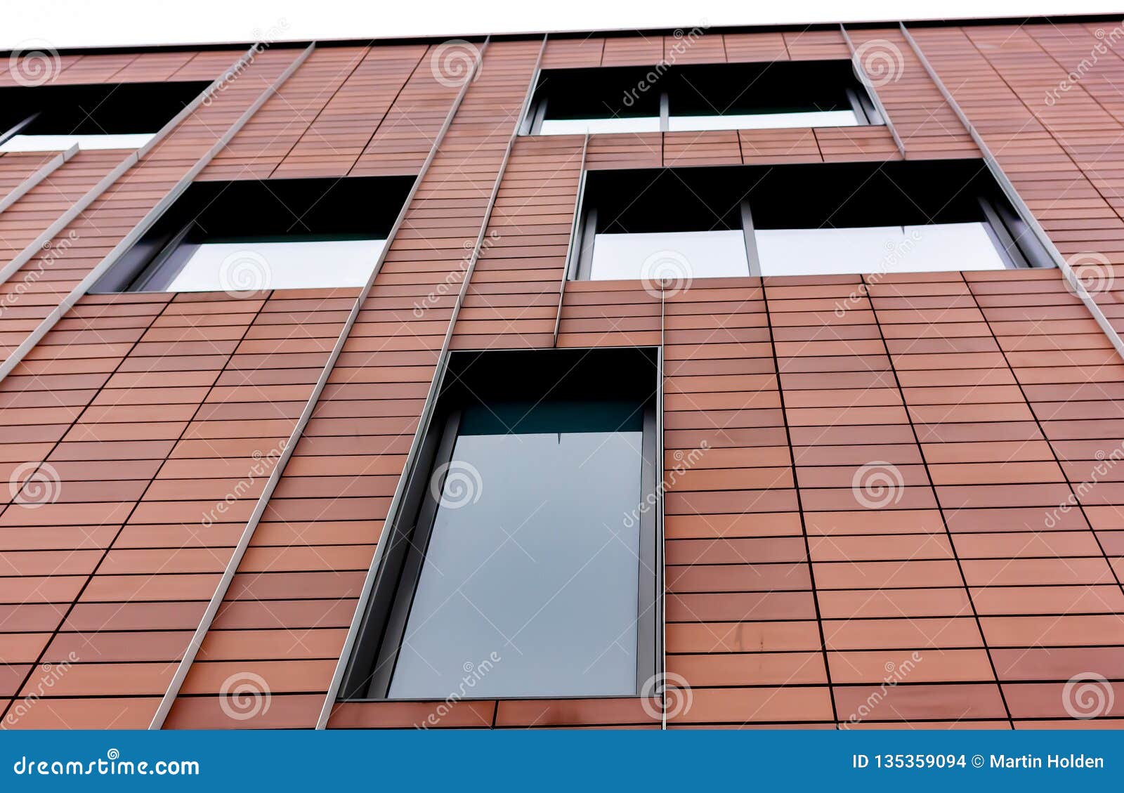 Red Cladding and Windows stock photo. Image of building - 135359094