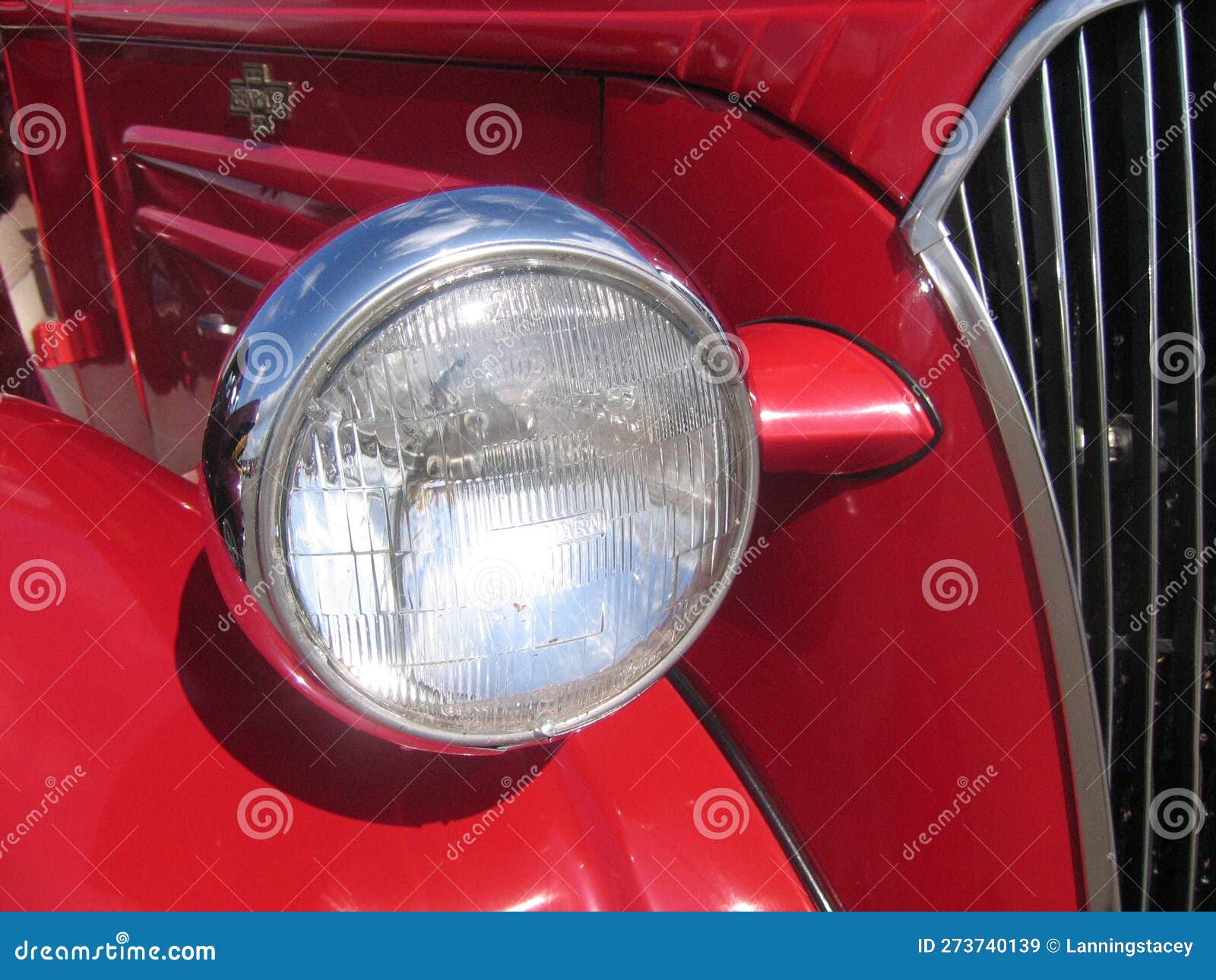 Red Classic Car Headlight and Partial Grill Stock Image - Image of ...
