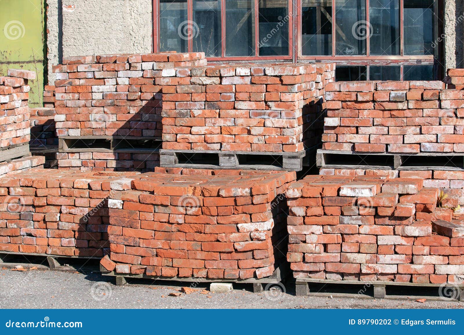 Red Clay Building Bricks Stacked on Pallets for Delivery Stock Photo ...