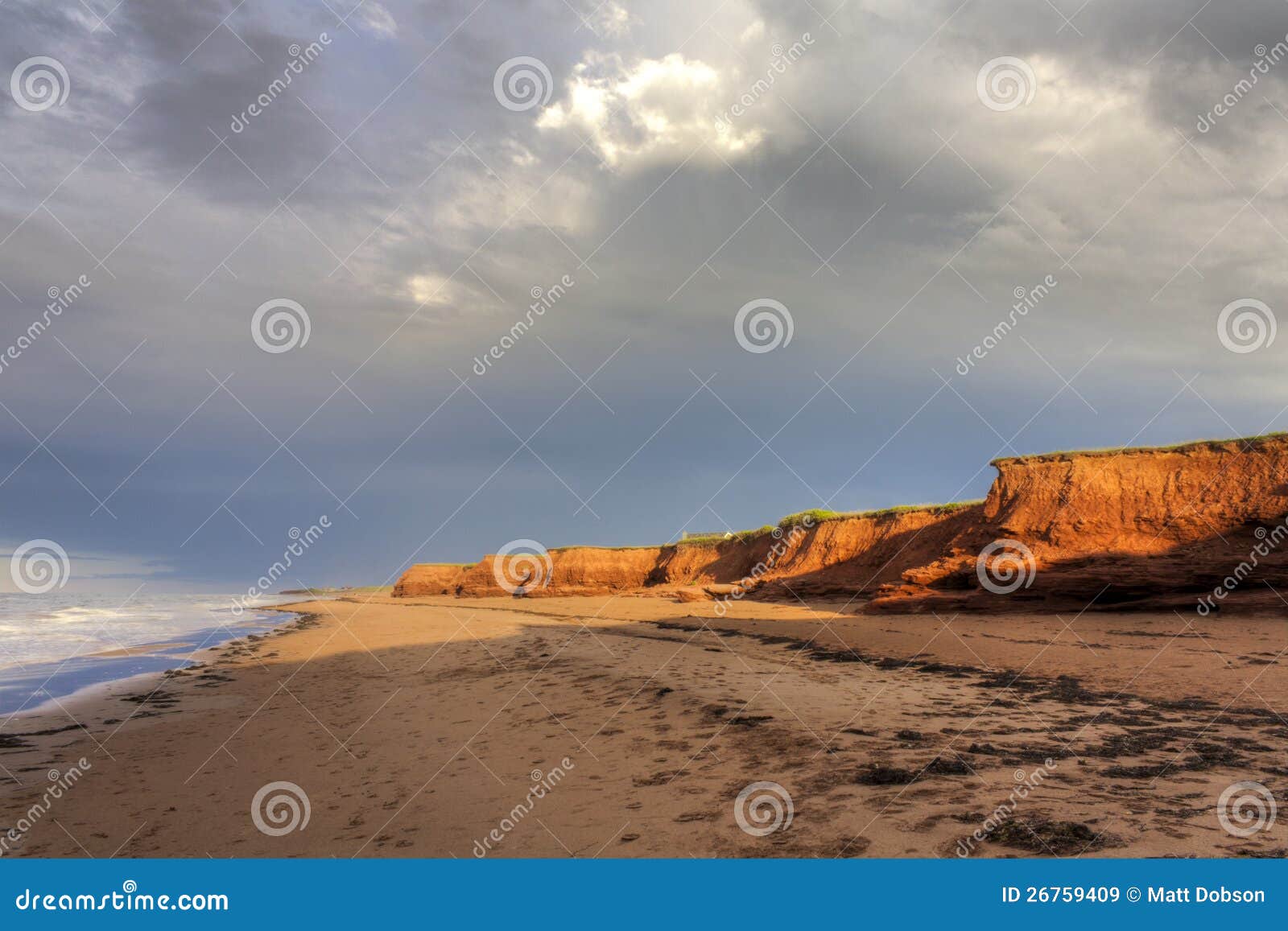 Red Cliffs on Prince Edward Island Stock Image - Image of dusk, thunder ...