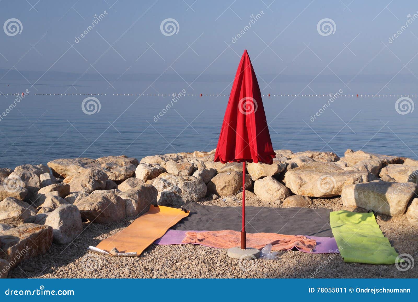 Red Closed Parasol on the Beach Stock Image - Image of evening, parasol ...