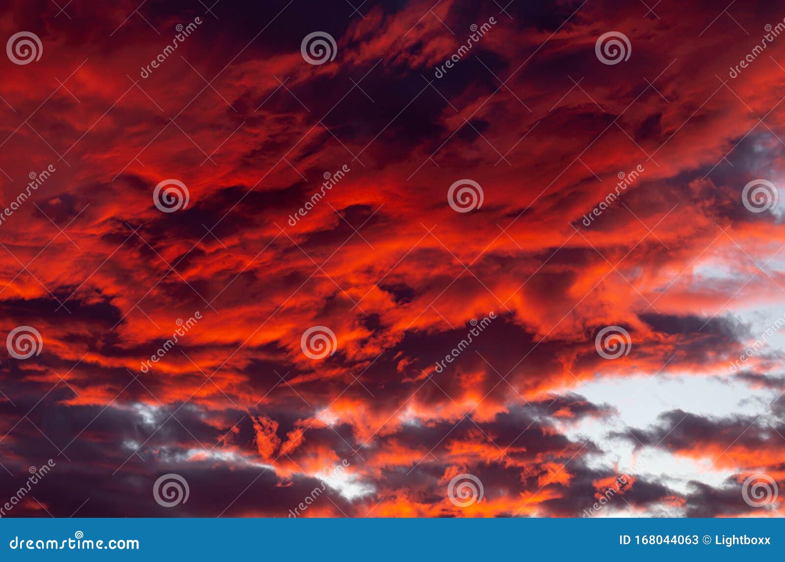 Dramatic Red clouds stock image. Image of dusk, color - 168044063