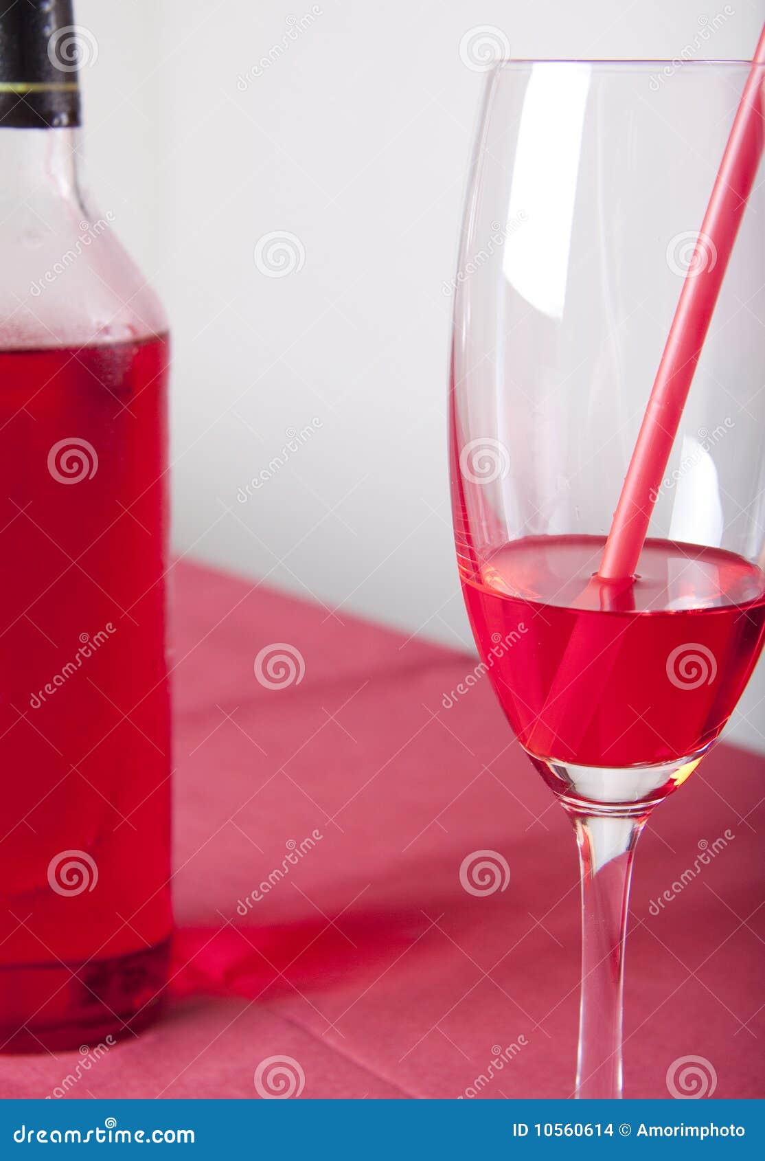 Red cocktail and bottle stock photo. Image of liquor - 10560614