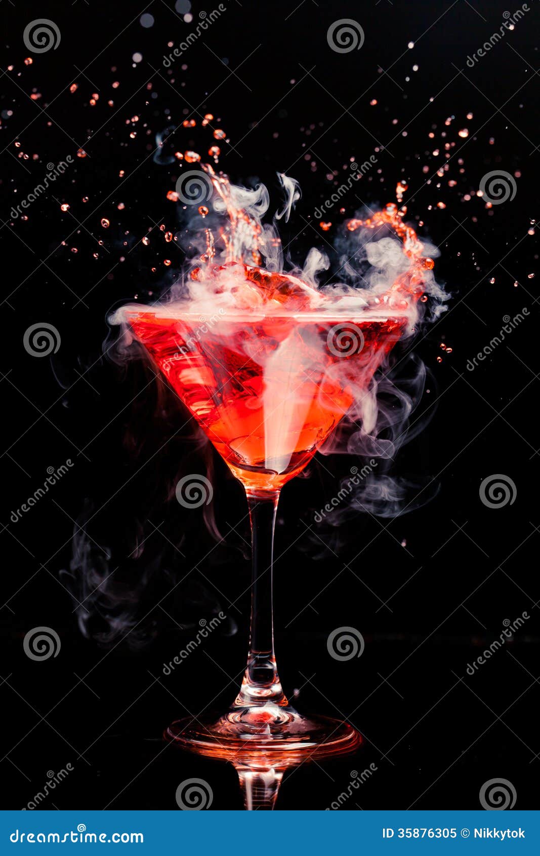 Red cocktail with splash stock image. Image of liquor - 35876305