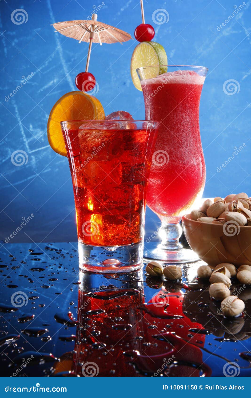 Red cocktails on blue stock photo. Image of chill, margarita - 10091150