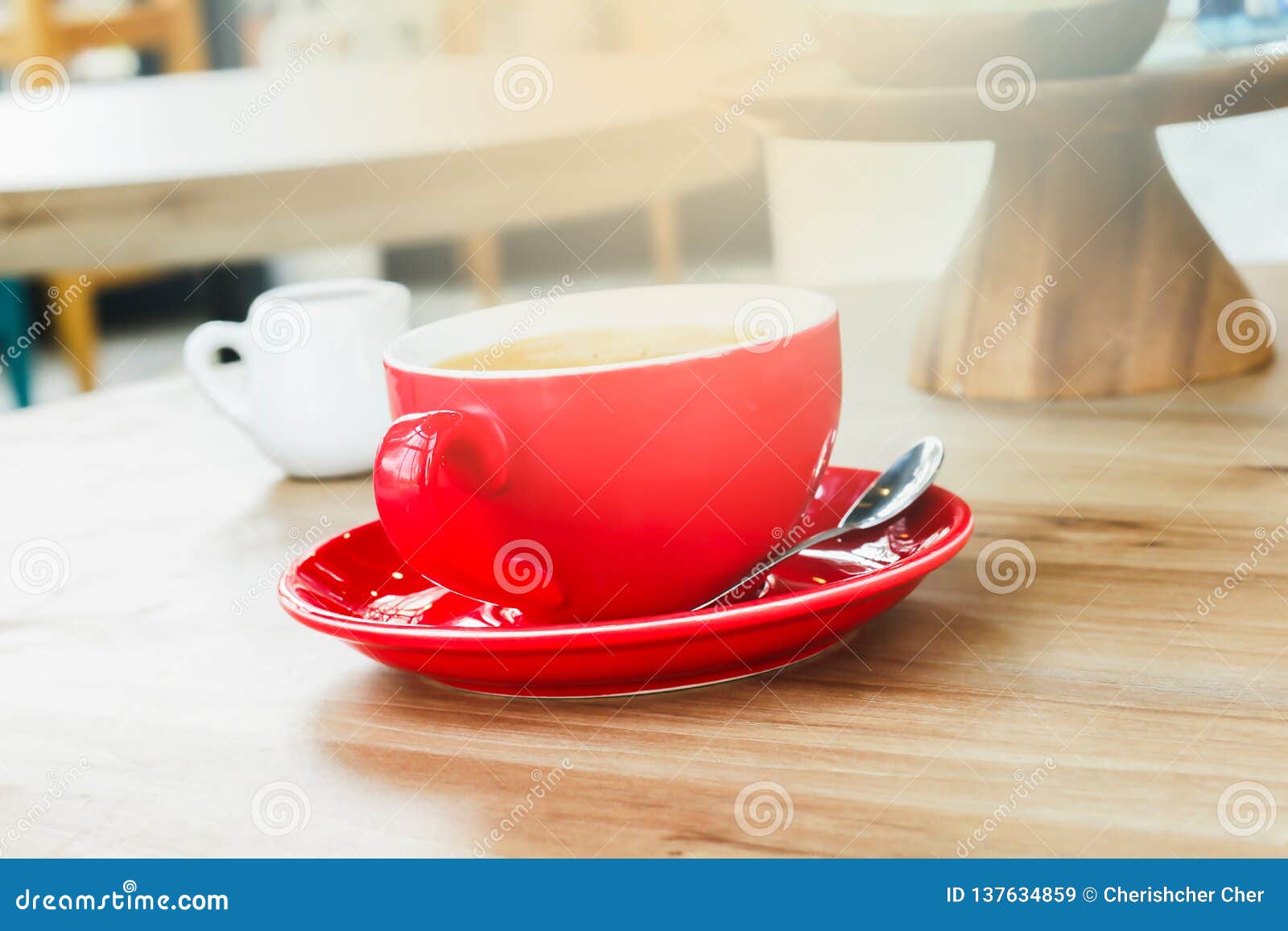 Red Coffee Mug on a Wooden Table in Coffee Shop. Stock Image - Image of ...