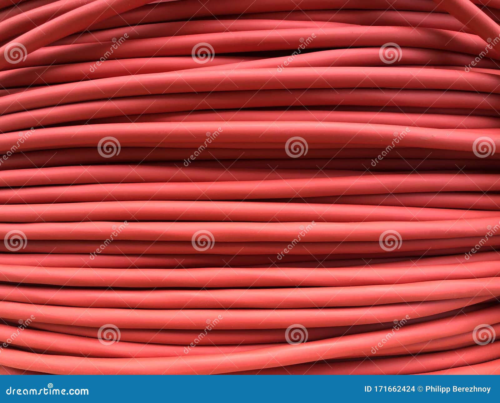Red Coiled Electrical Cable on the Wooden Spool Stock Photo - Image of ...