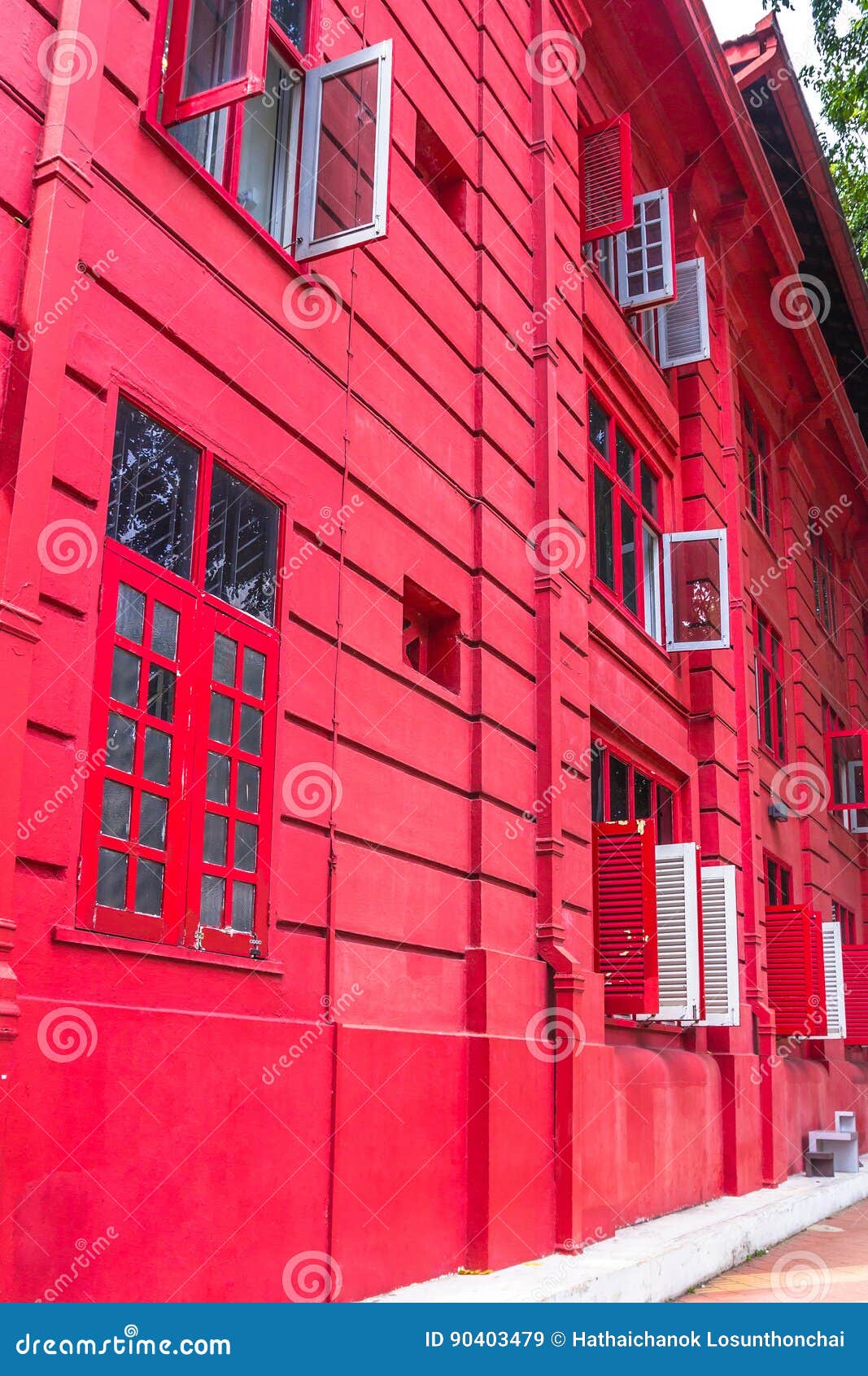Red Colonial Building with Red Door and Red Windows Stock Image - Image ...