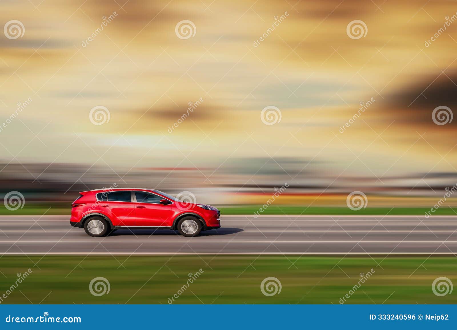 Red Color Car Driving at High Speed with Blurred Background Stock Photo ...