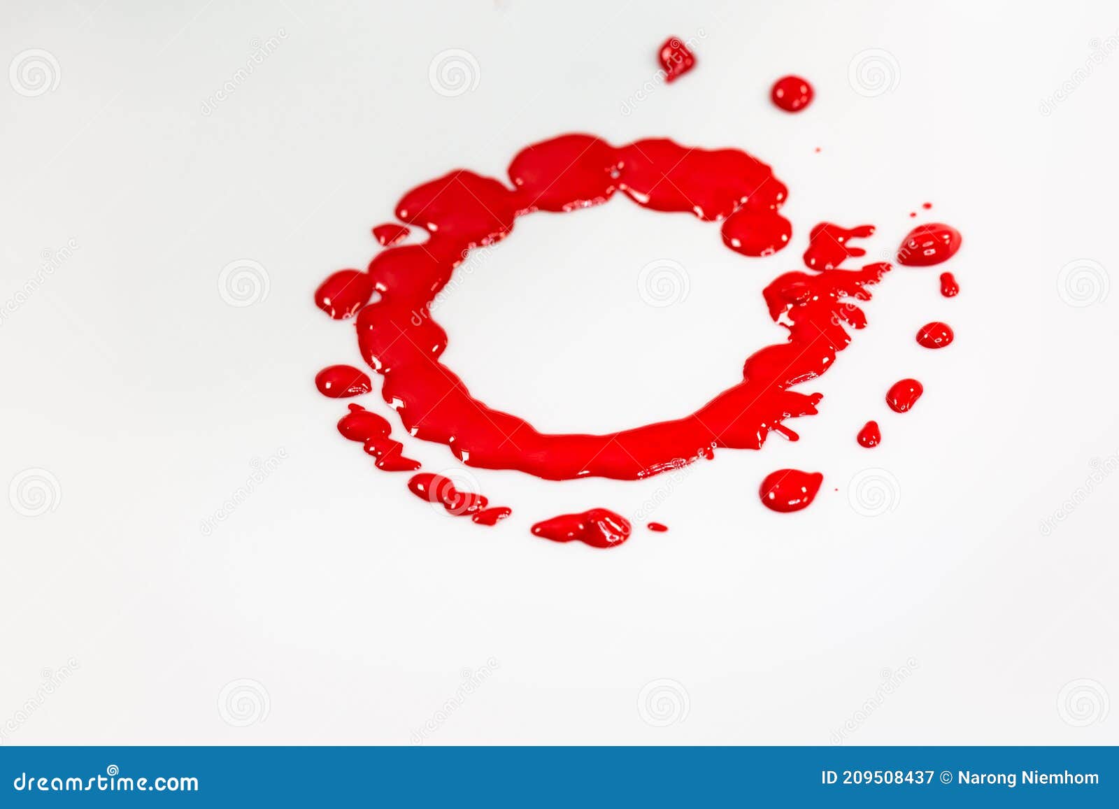 A Red Circle Drips Onto a Spinning White Background. Stock Image ...