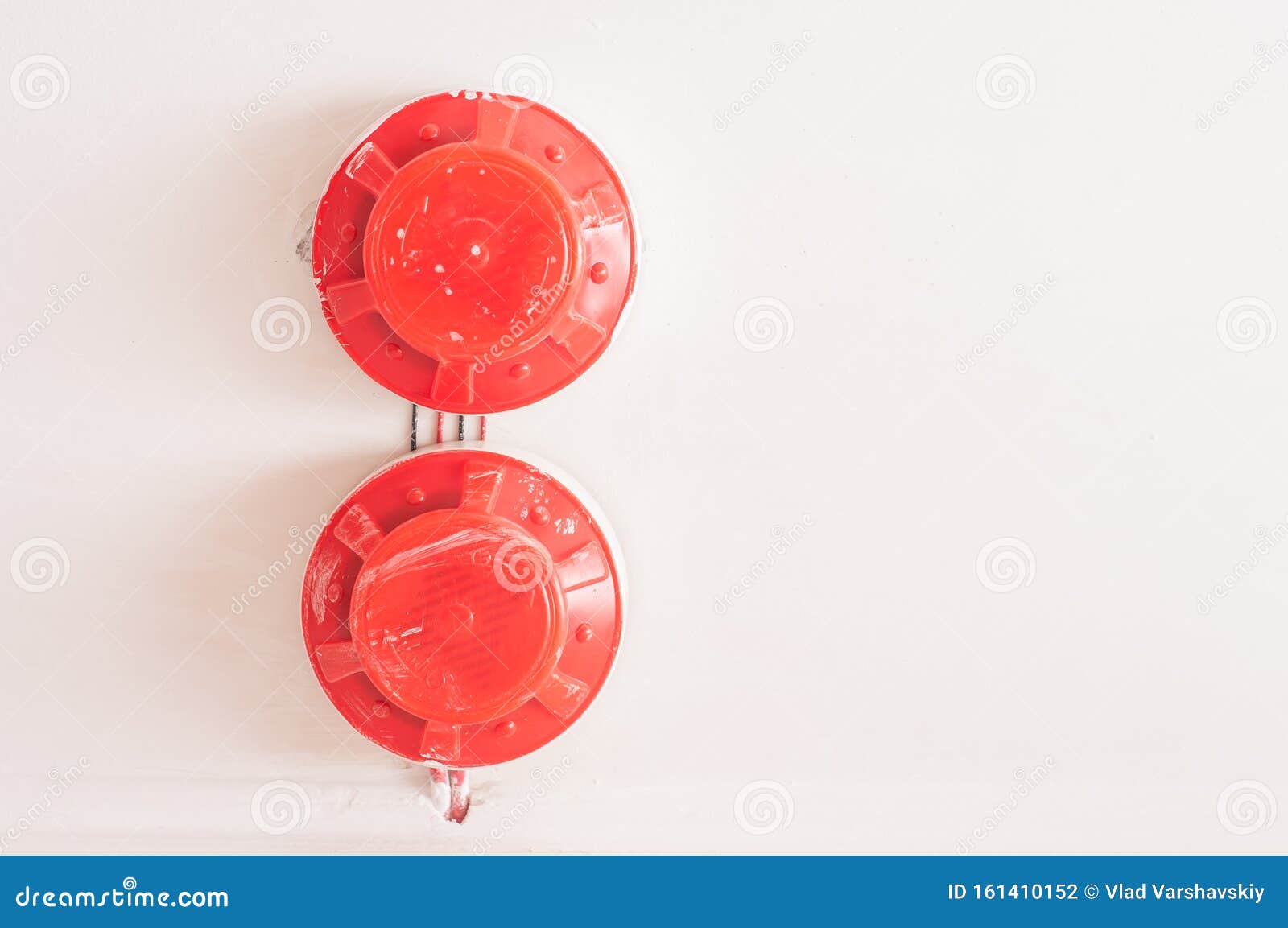 Red Color Fire Detector Mounted on the Ceiling. Sensor Triggered by ...