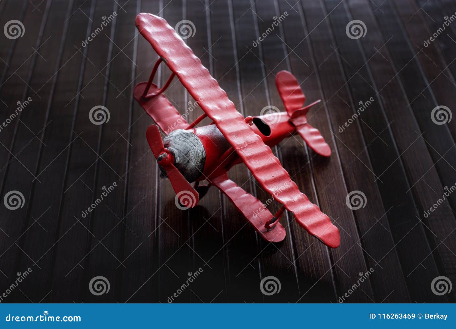 Red Color Toy Plane on Wooden Texture Stock Image - Image of ...