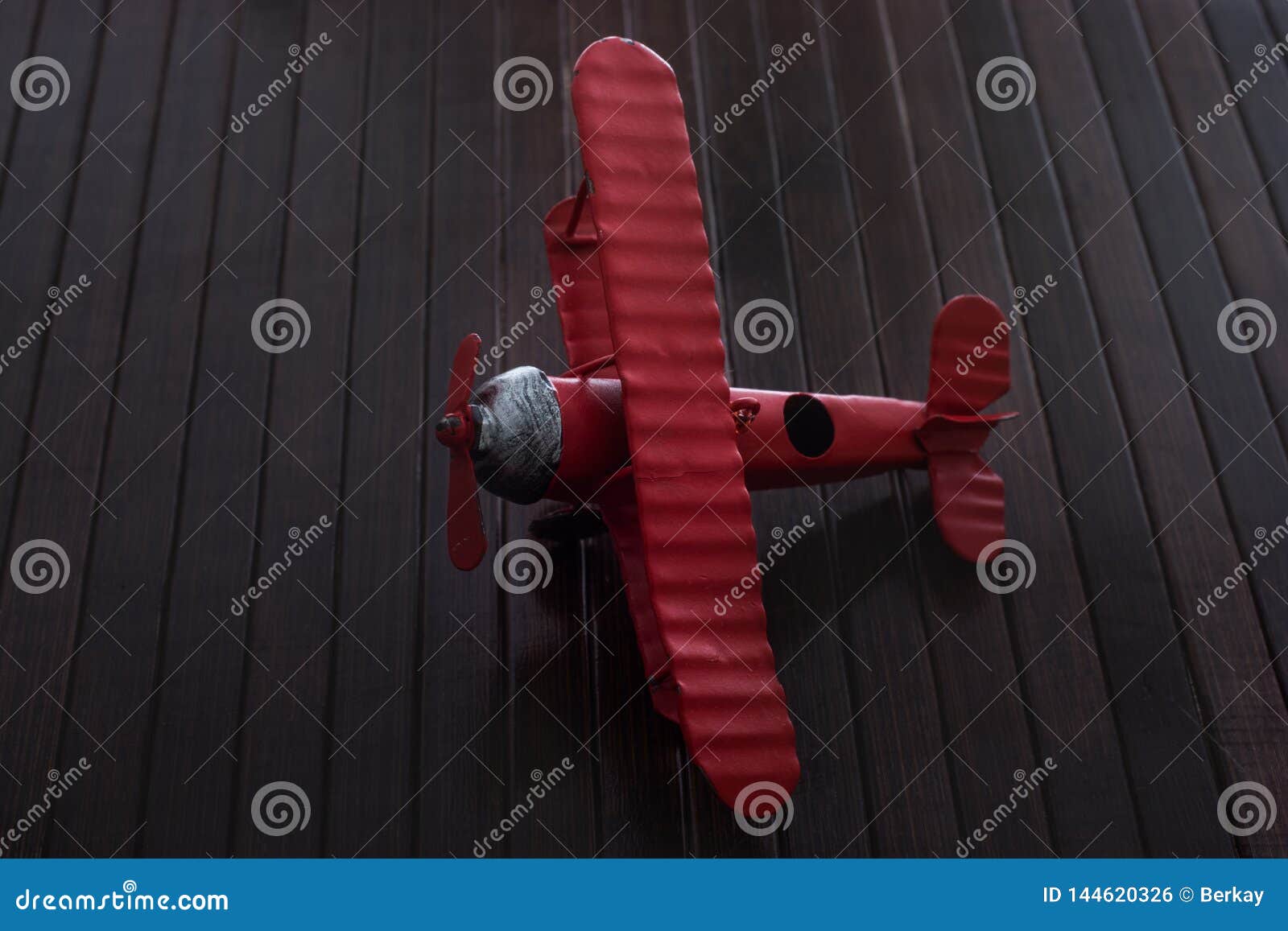 Red Color Toy Plane on Wooden Texture Stock Photo - Image of transport ...