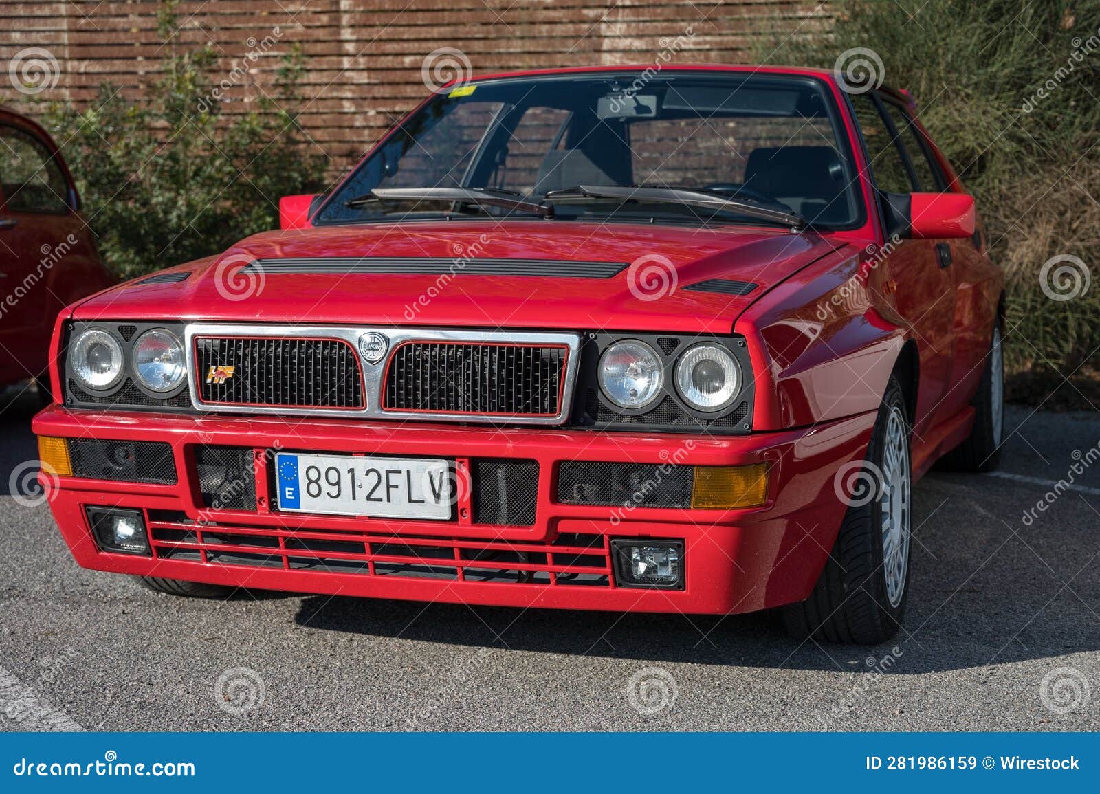 Red-colored Lancia Delta HF Parked on the Street Editorial Stock Image ...