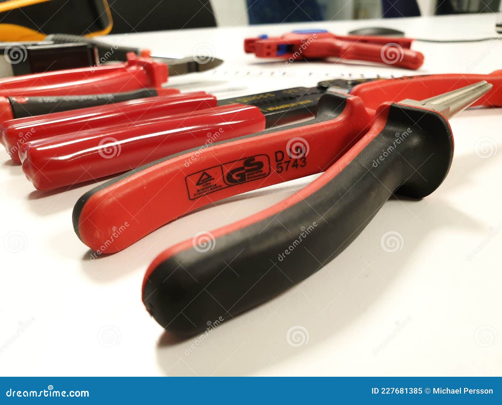 Red Colored Tools and Equipment in Office Setting Stock Image - Image ...
