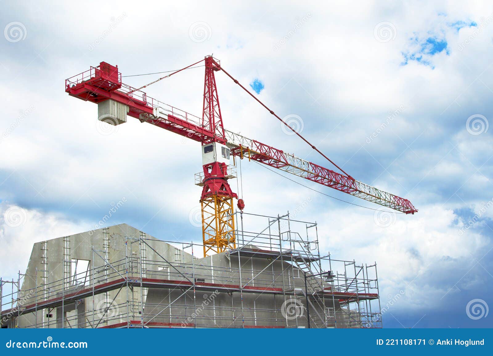 Red Construction Crane Over Bulding in Progress Against Blue Sky Stock ...