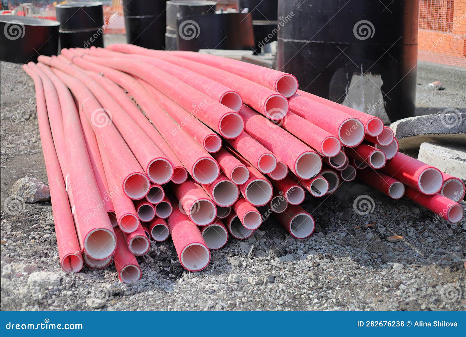 Red Corrugated Pipe for Wire at Construction Site. Cable Conduit for ...