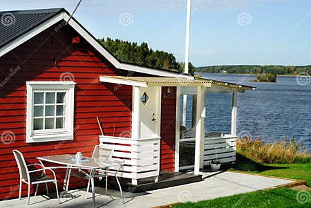 Red cottage by lake stock photo. Image of cottage, travel - 30708024
