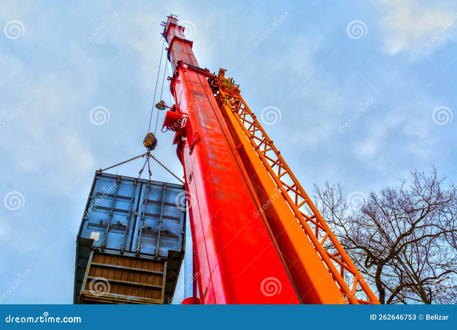 Red Crane Machine is Lifting a Container Stock Image - Image of crane ...