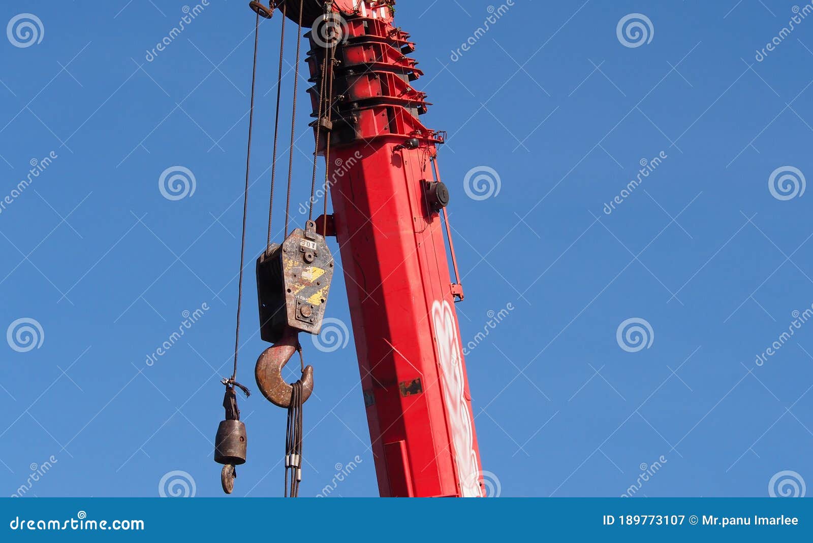 Red Crane Works in Construction Site with Hooks Stock Image - Image of ...
