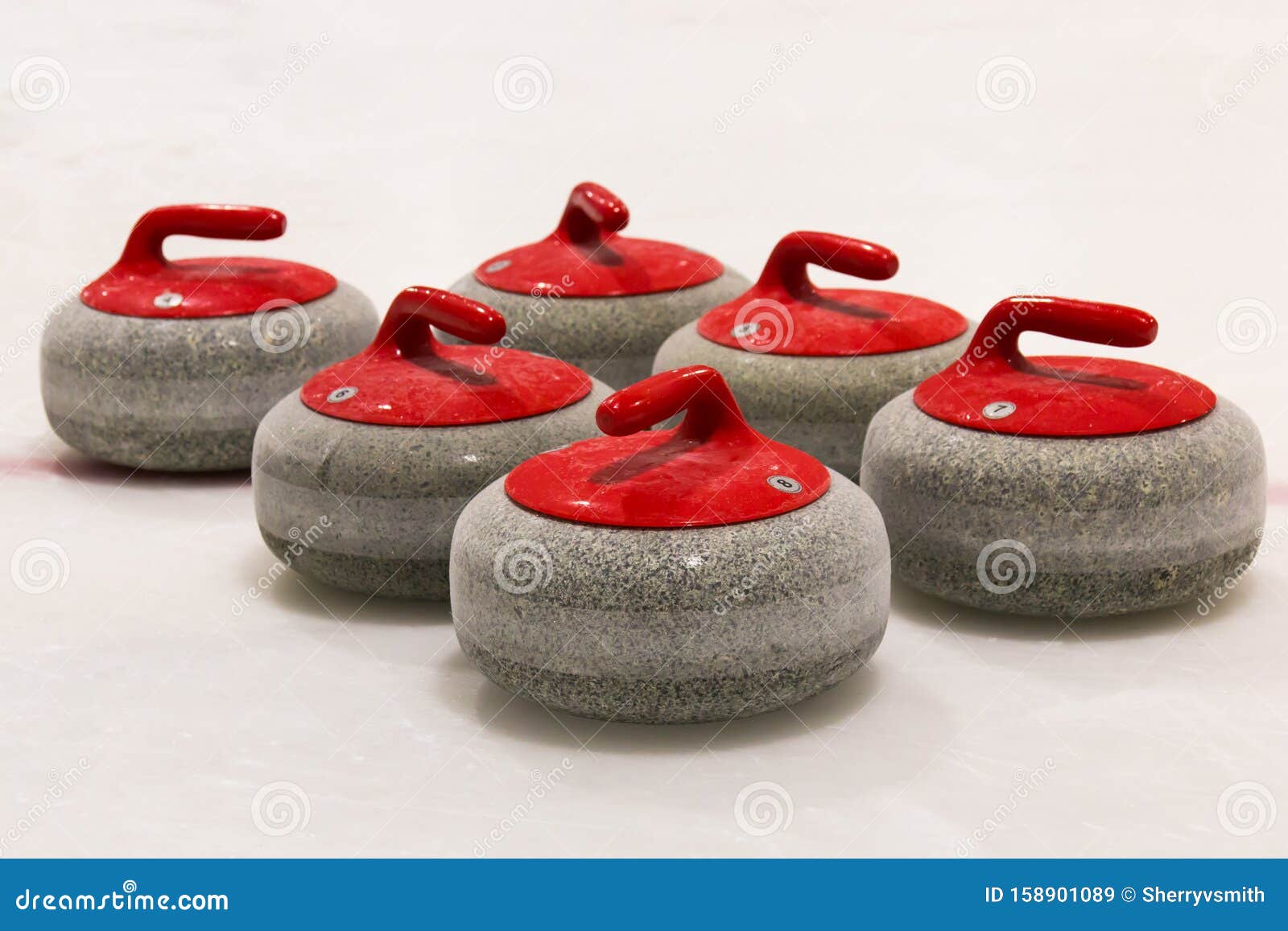 Red Curling Stones on Ice stock image. Image of reflection - 158901089