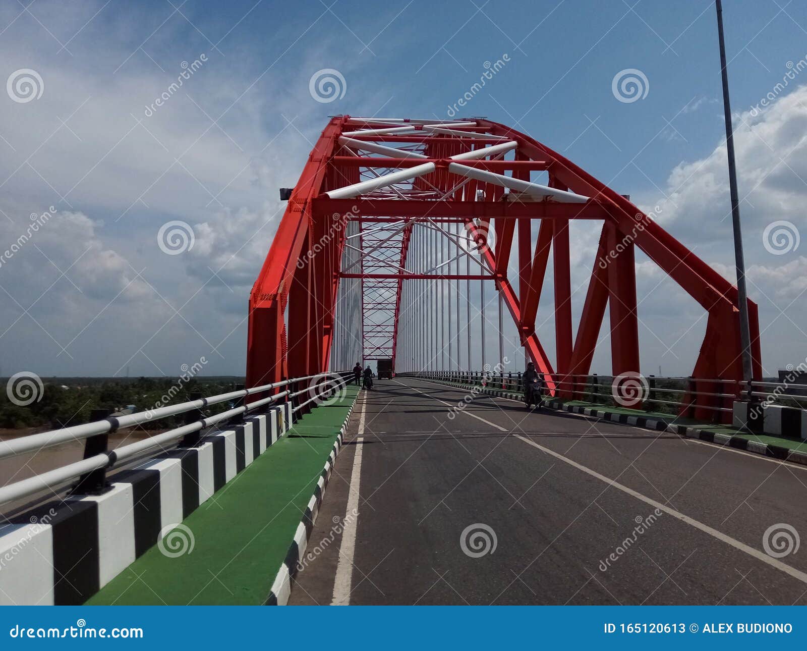 Red Curved Suspension Bridge Stock Image - Image of bridge, suspension ...