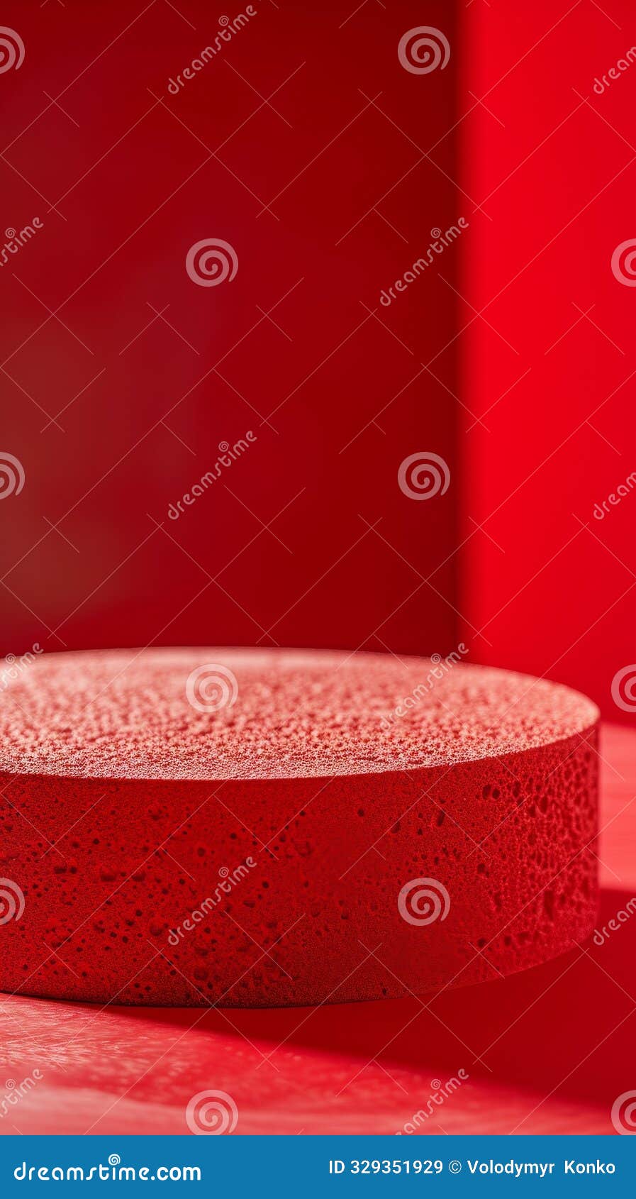Red Cylindrical Textured Object on Monochromatic Red Background ...