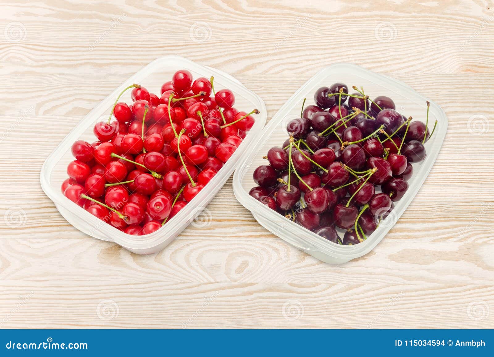 Two Varieties of Cherries in Two Different Plastic Containers Stock ...