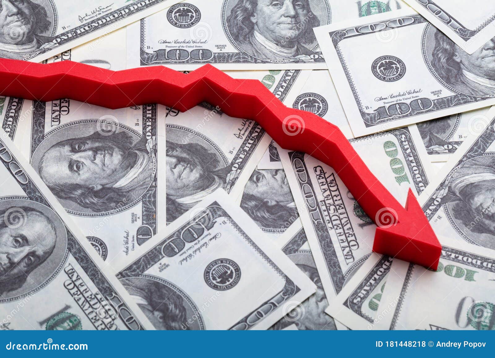 Red Decreasing Arrow Sign Over Banknotes Stock Photo - Image of ...