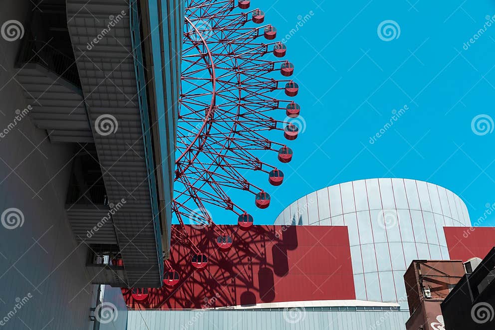 A Red Devil Wheel in Osaka, Japan Stock Photo - Image of architecture ...