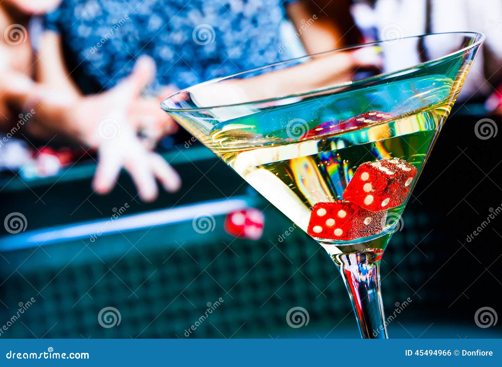 Red Dice in the Cocktail Glass in Front of Gambling Table Stock Photo ...