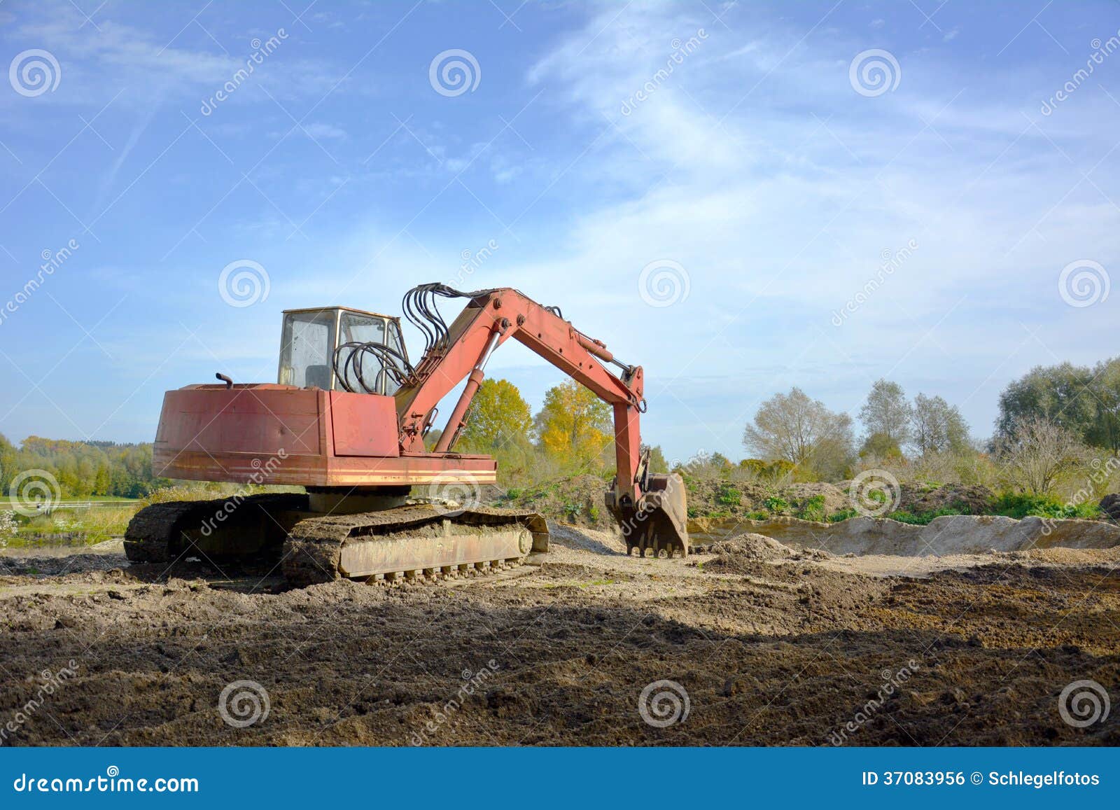 Red digger in nature stock photo. Image of dirt, size - 37083956