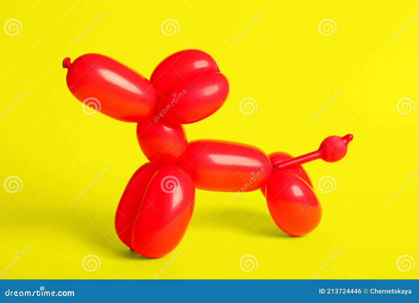 Dog Figure Made Of Modelling Balloon And Chinese Finger Trap On Orange ...