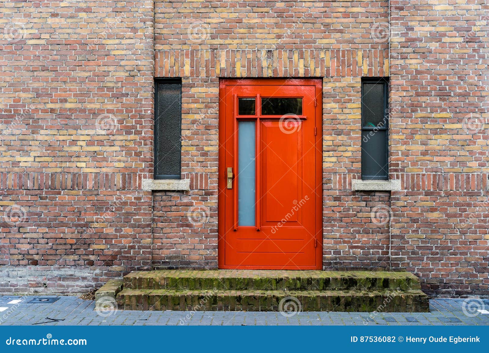 Red door in old building stock photo. Image of sunshine - 87536082