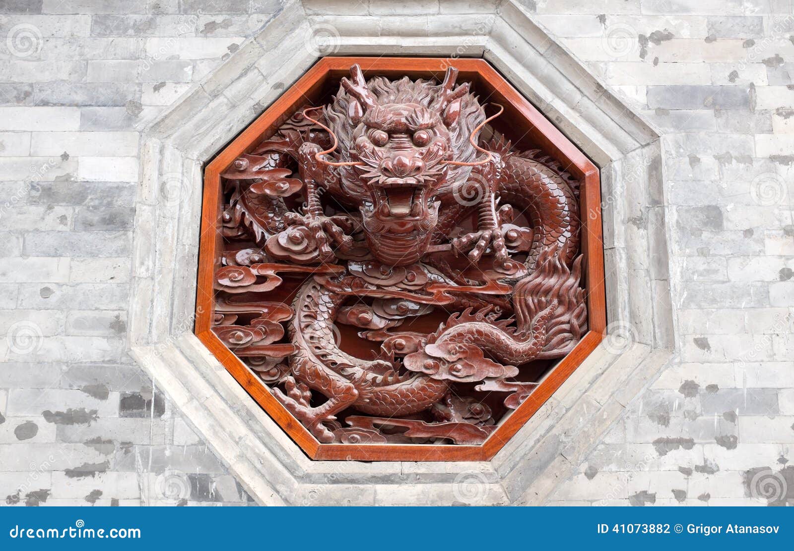 Red dragon carving on wall stock photo. Image of mythological - 41073882