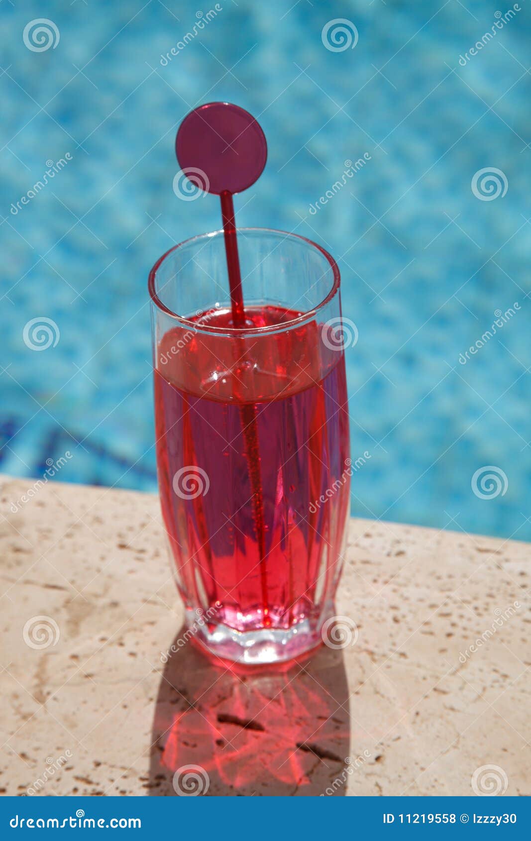 Red drink at the pool stock photo. Image of lifestyles - 11219558