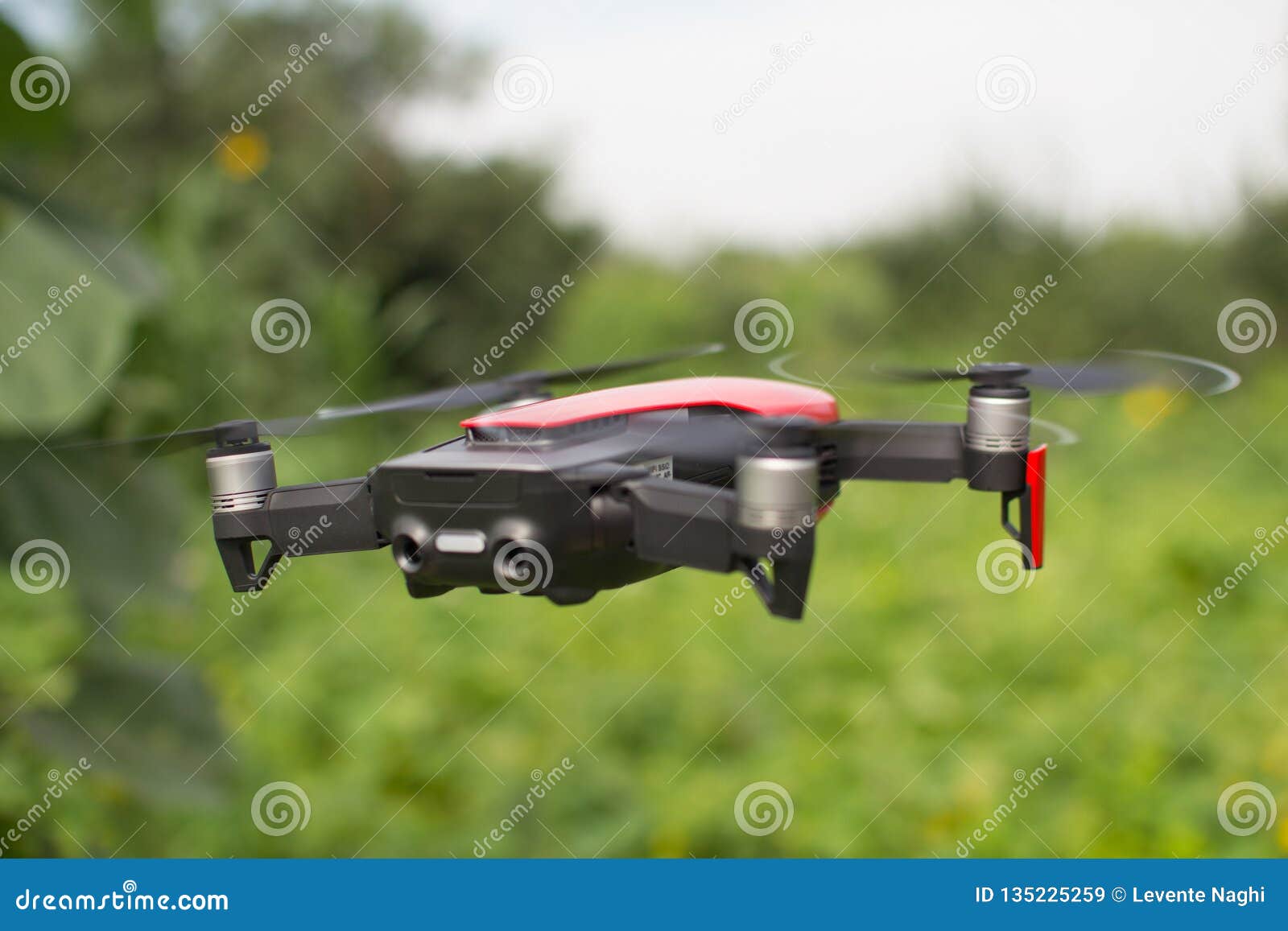 Red Drone Hovering in the Air Stock Image - Image of beautiful ...