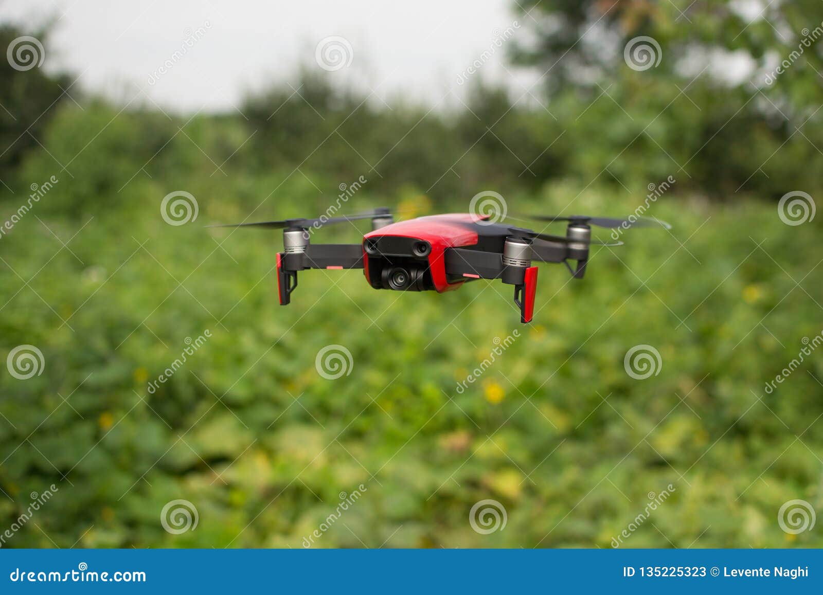 Red Drone Hovering in the Air Stock Image - Image of technology, nature ...