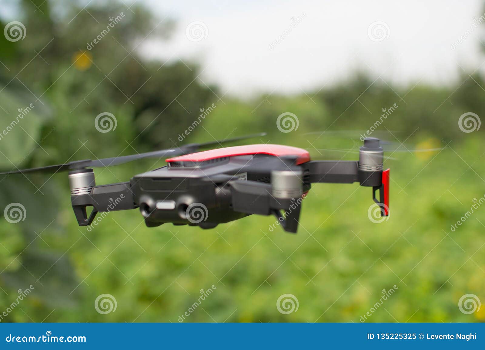 Red Drone Hovering in the Air Stock Image - Image of illustrative ...