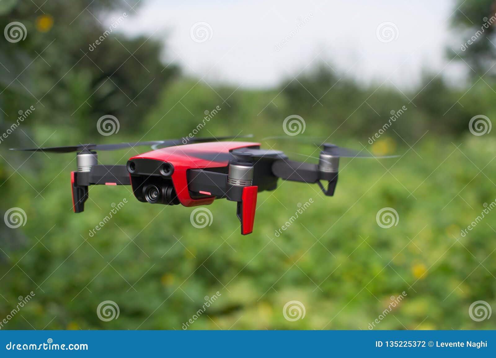 Red Drone Hovering in the Air Stock Photo - Image of video, aircraft ...