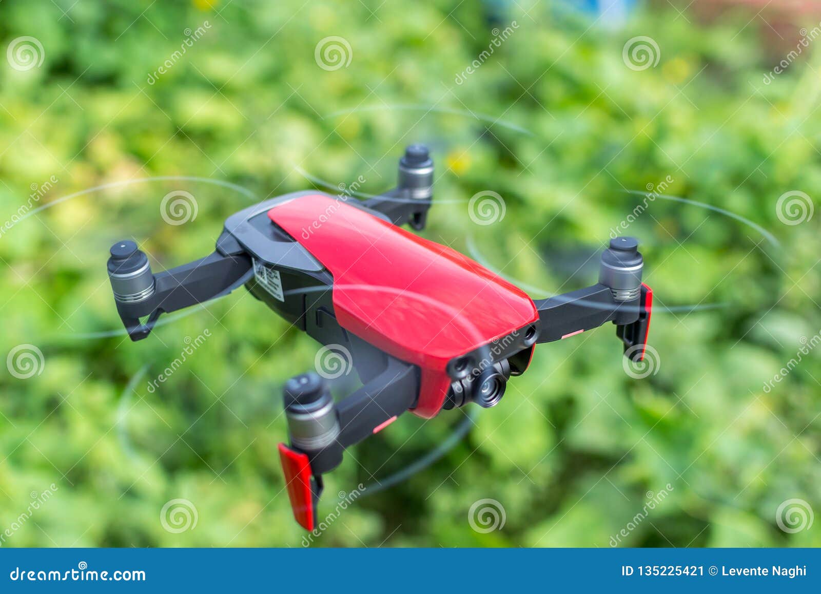 Red Drone Hovering in the Air Stock Image - Image of innovation, nature ...