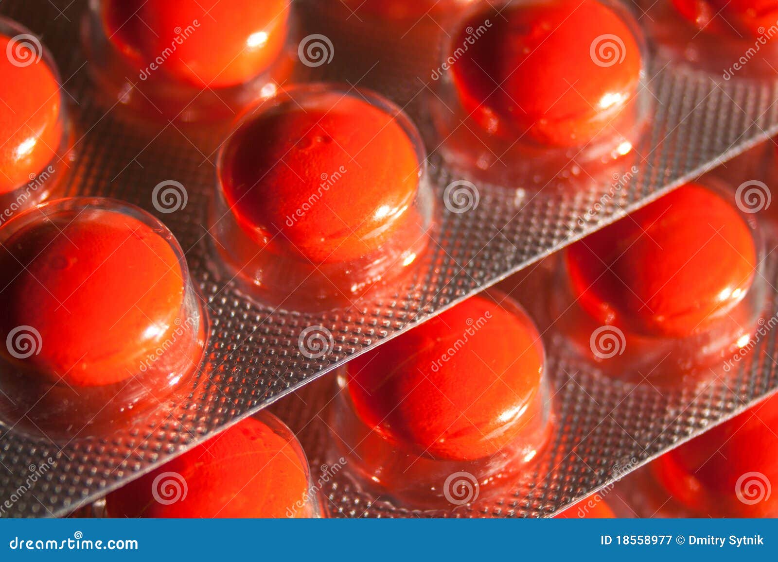 Red drugs on packed stock image. Image of sickness, packed - 18558977